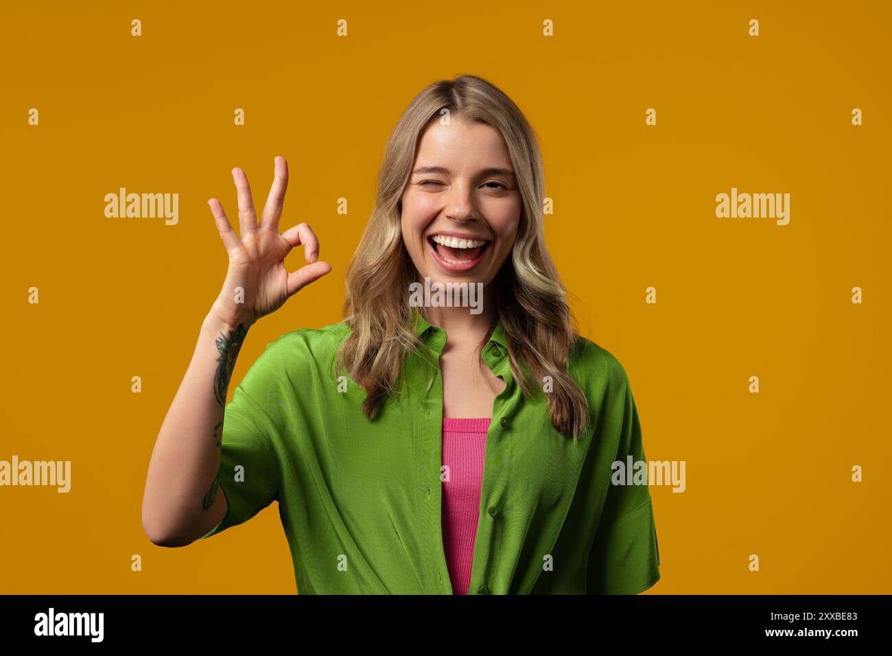 Pretty woman makes hand sign okay, ok gesture. Happy girl, correct ...