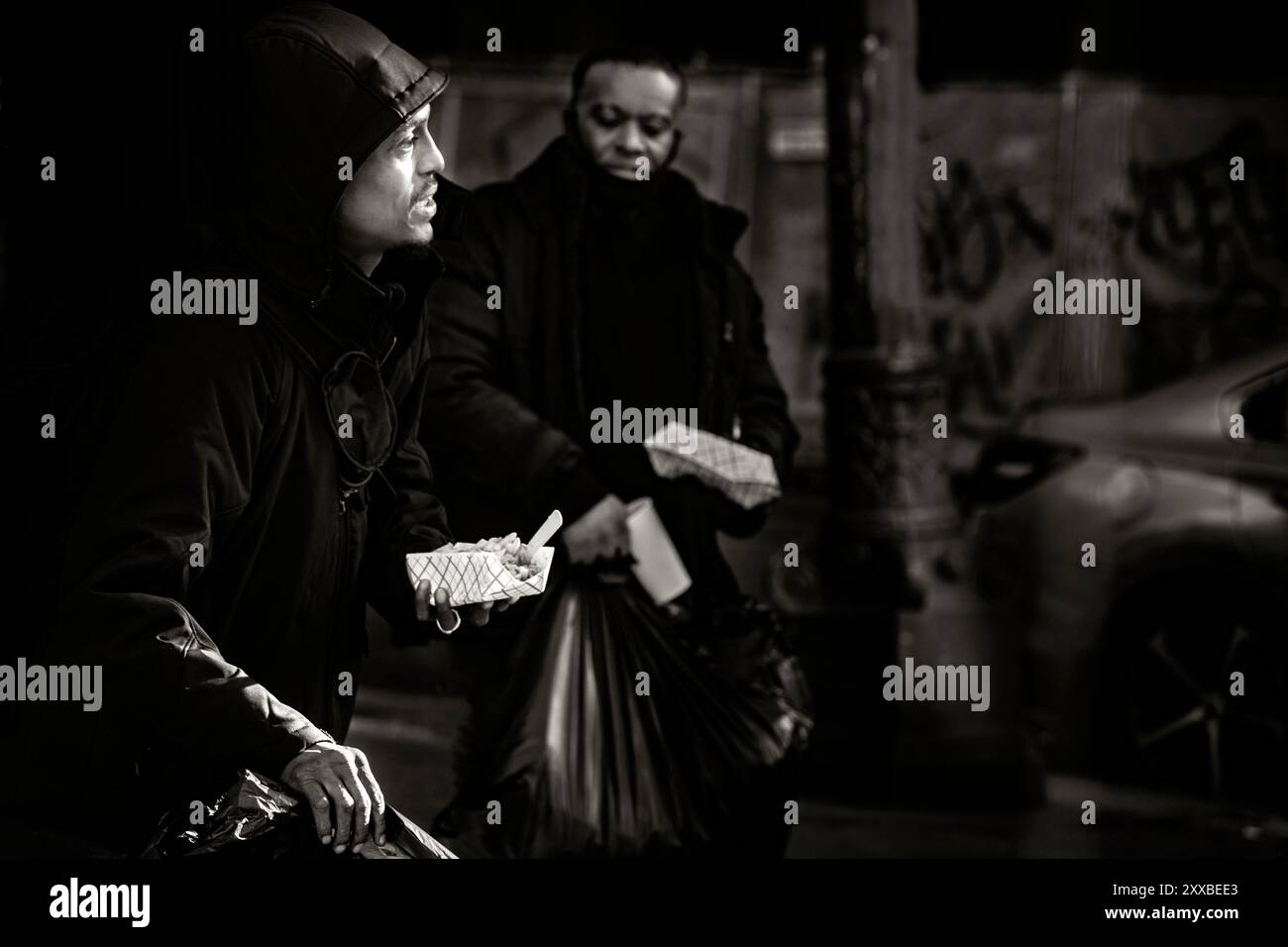 ARC-0240-BW.....WASHINGTON - Homeless men in Seattle receive a hot ...