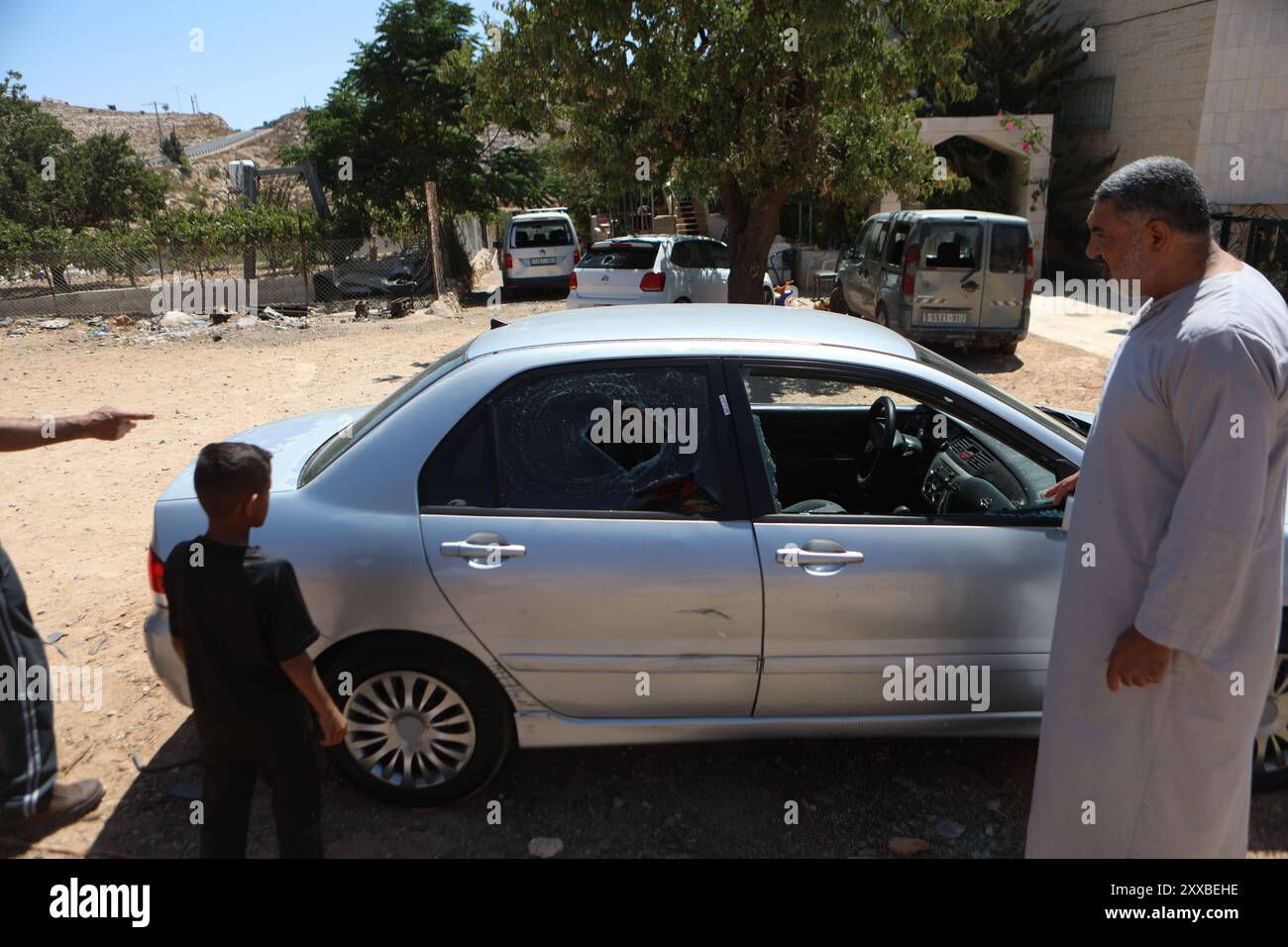 A view of destroyed vehicle as Jewish people has raided the town of ...