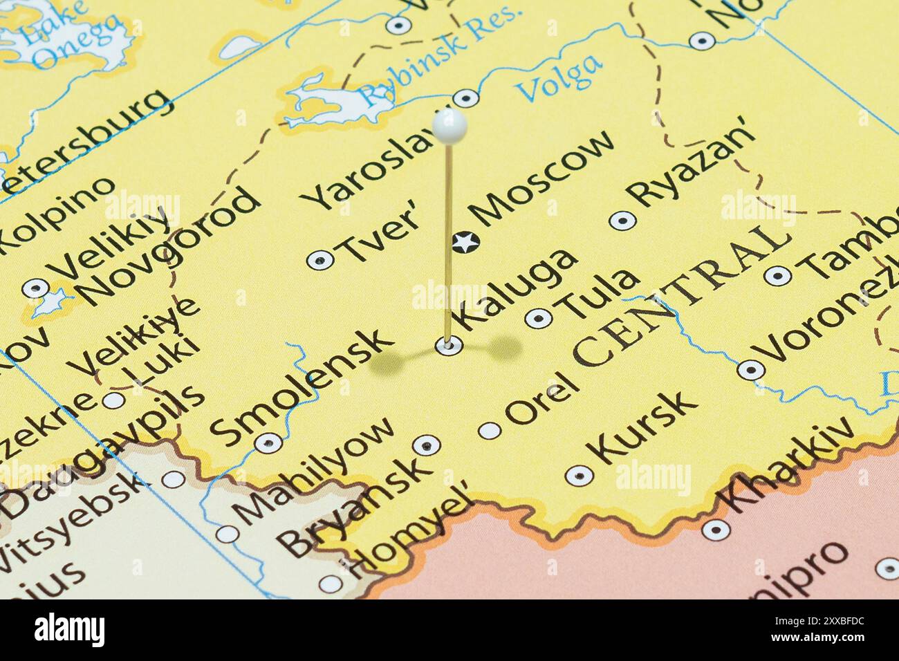 Close up to a Kaluga city with a blue pin needle into Russia country ...