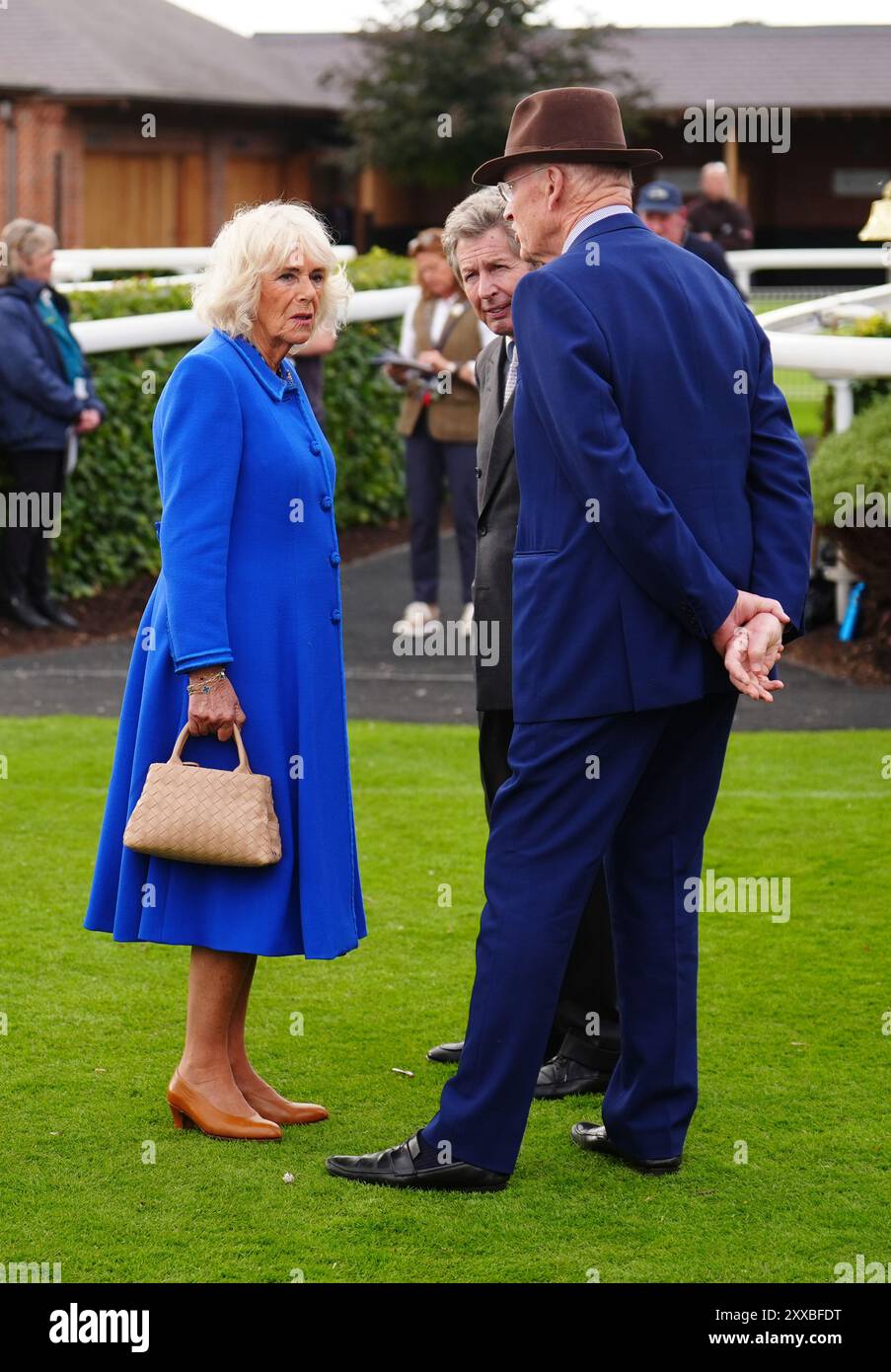 Queen Camilla with racing manager John Warren (centre) and trainer John ...