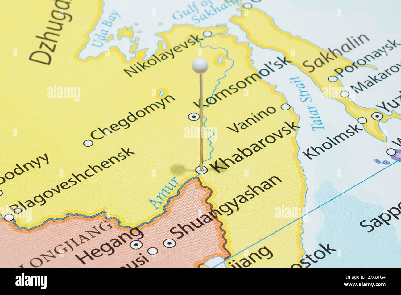 Close up to a Khabarovsk city with a white pin needle into Russia ...