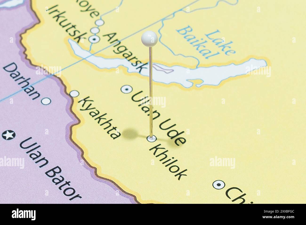 Close up to a Khilok city with a blue pin needle into Russia country ...