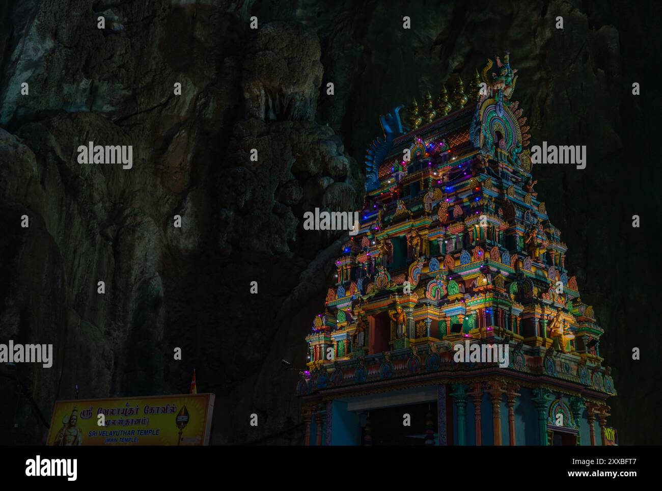 A picture of a colorful Hindu shrine inside of the Batu Caves Stock ...