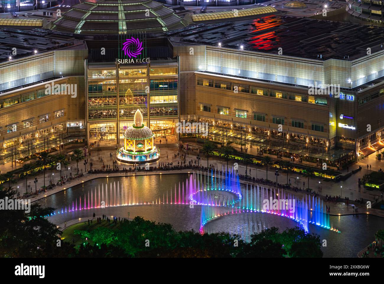 A picture of the KLCC Park water and light fountain show and the Suria ...