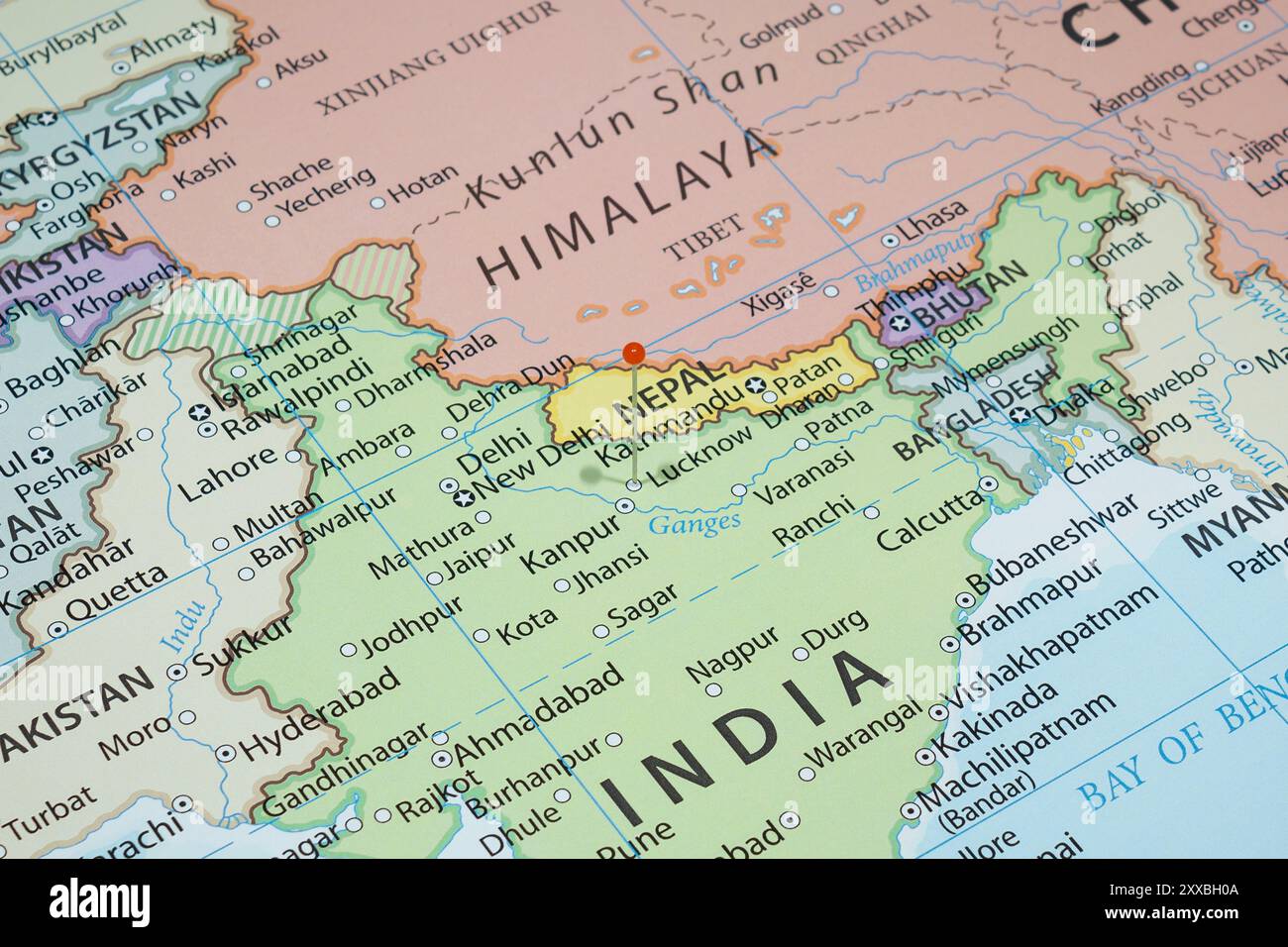 Close up to a Lucknow city with an orange pin needle into India country ...