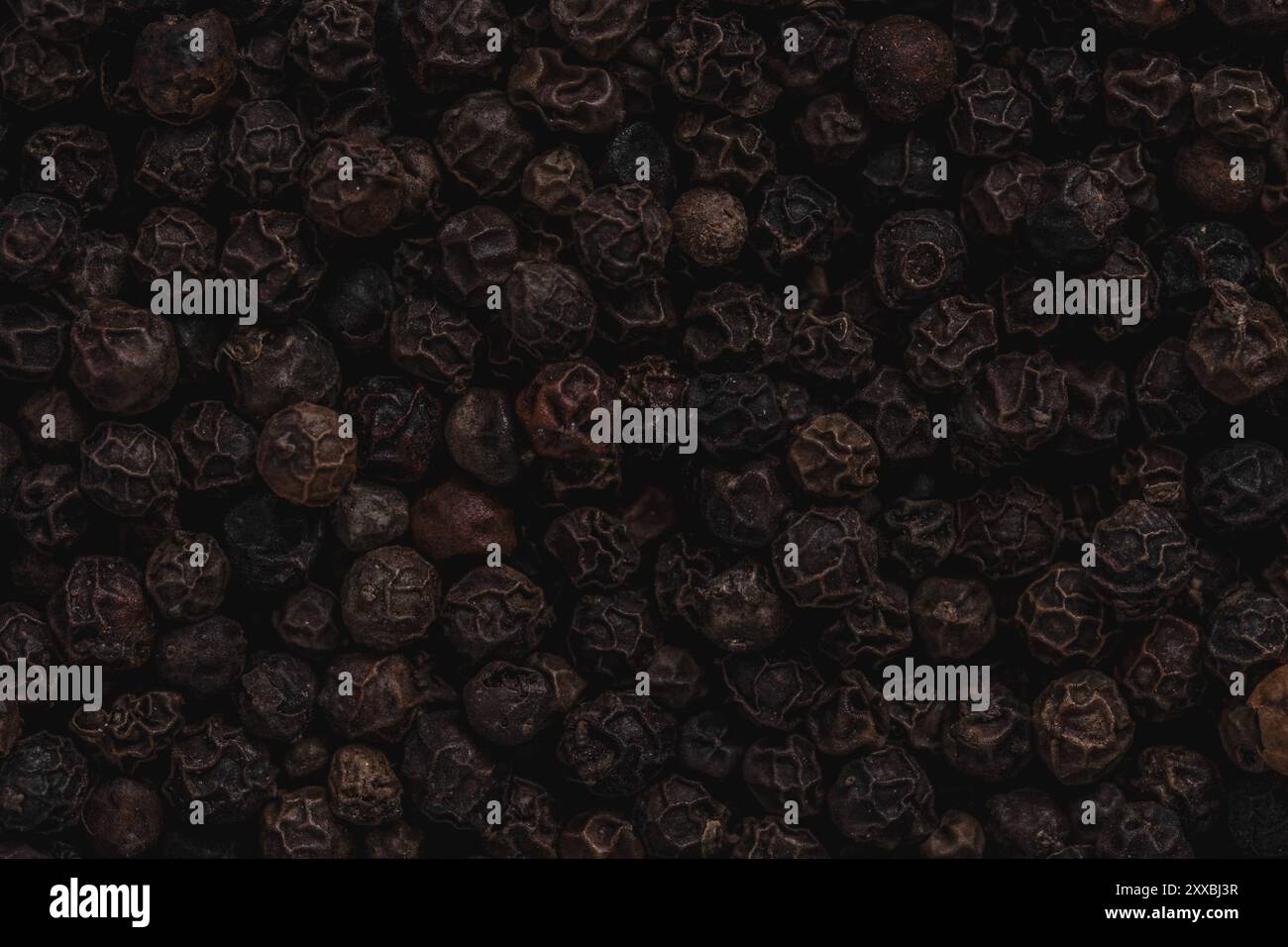 Black pepper background. Peppercorns texture Stock Photo - Alamy