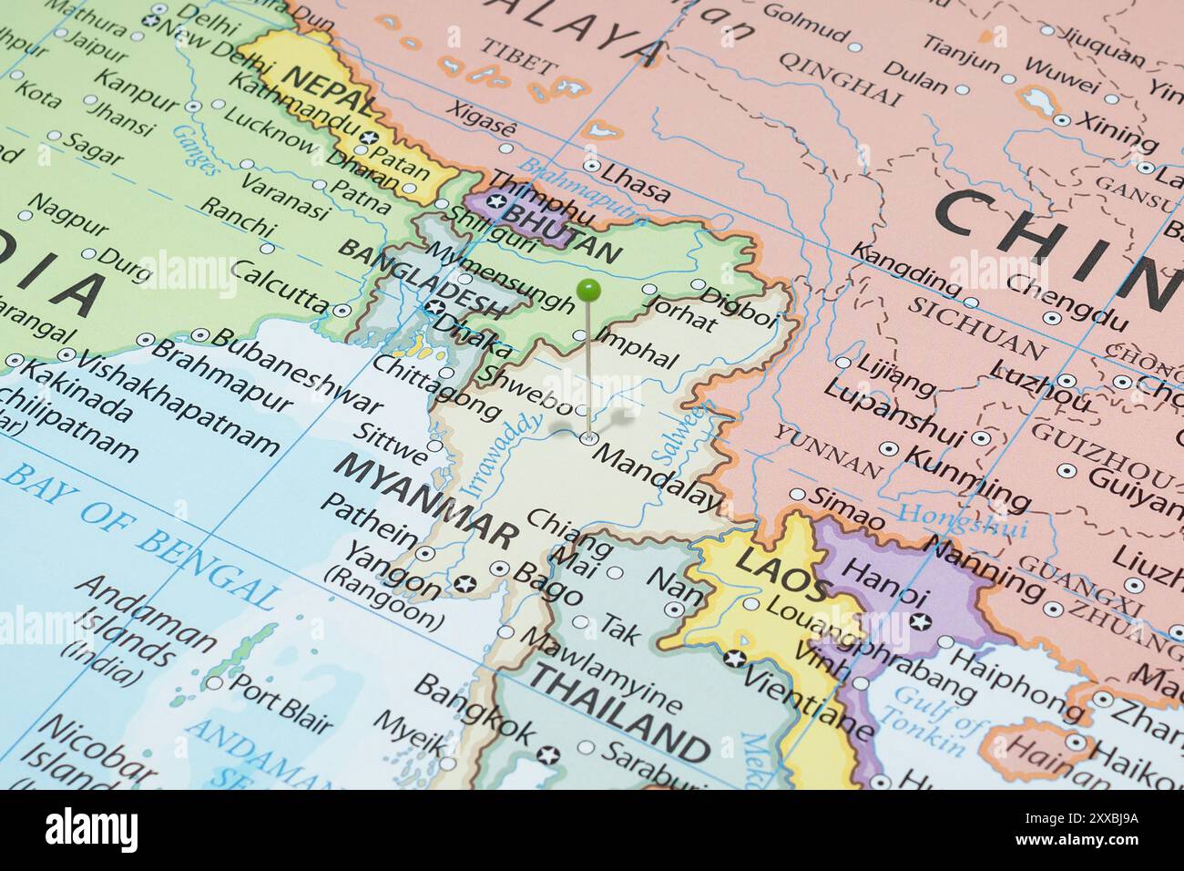 Close up to a Mandalay city with a green pin needle into Myanmar ...