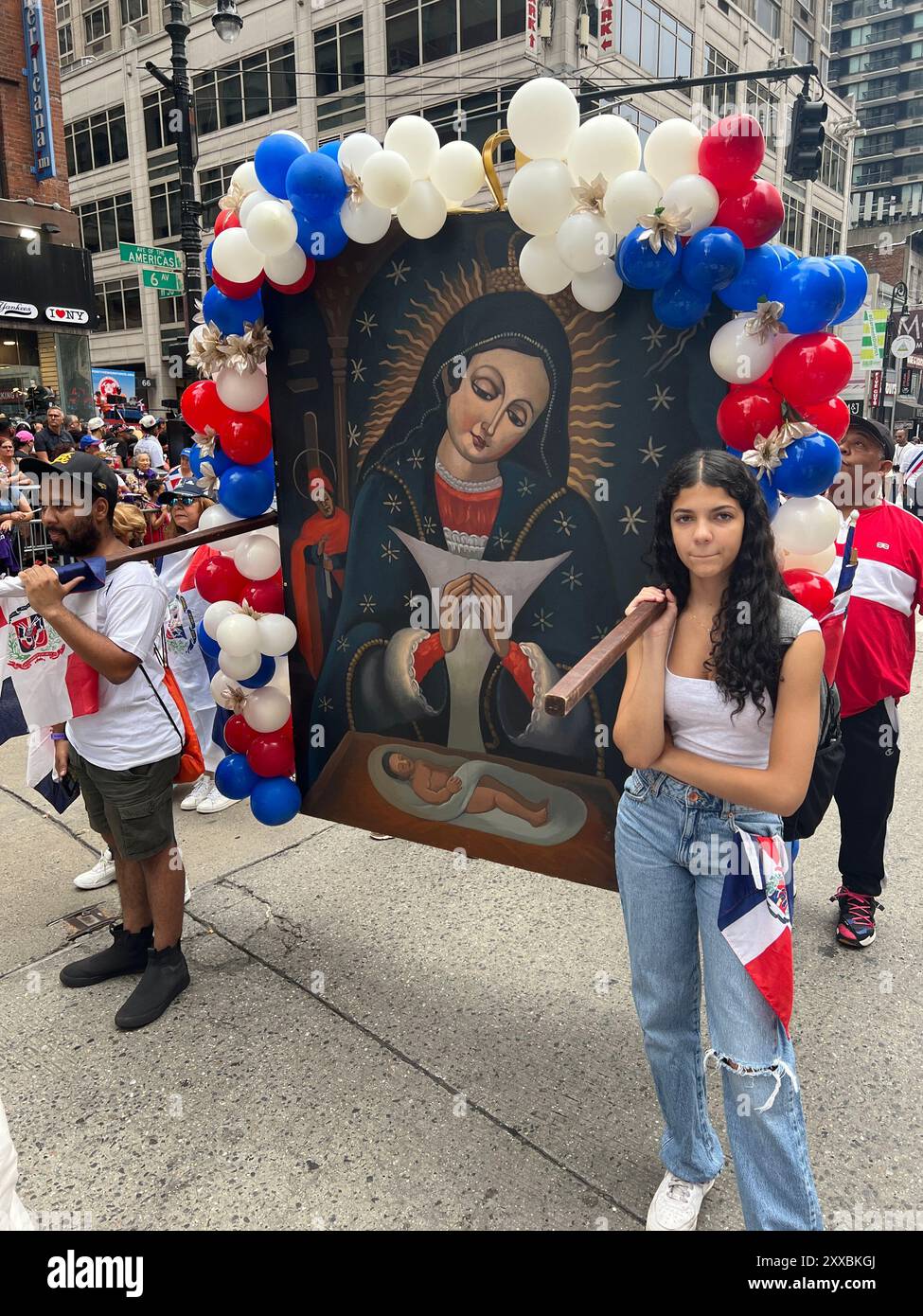 Dominican Day Parade: Group carries a portrait of the "Blessed Mary" in ...