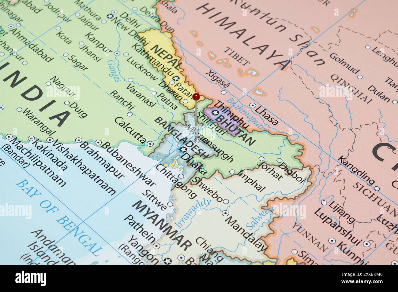 Close up to a Mymensingh city with a red pin needle into Bangladesh ...