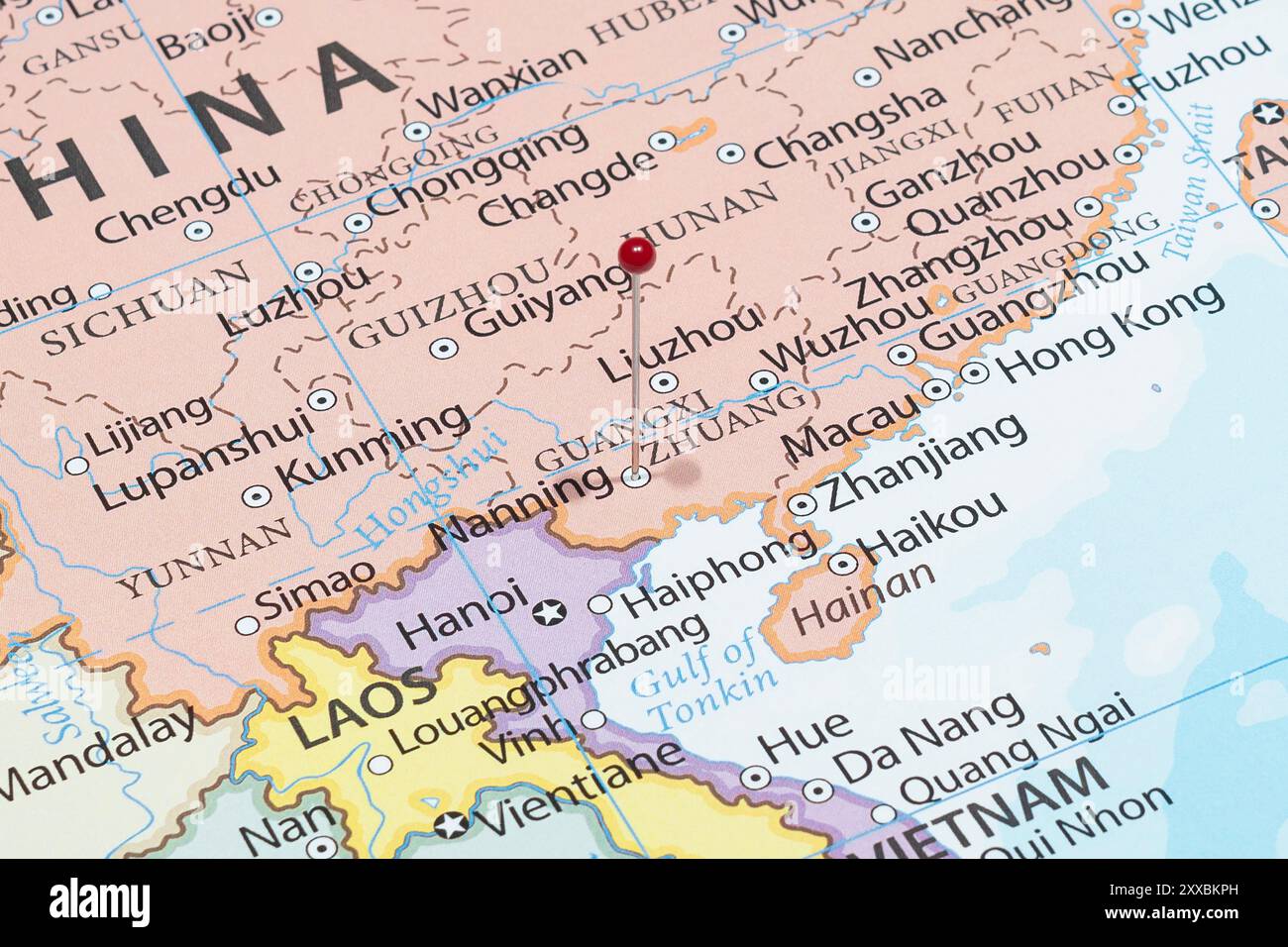 Close up to a Nantong city with a red pin needle into China country ...