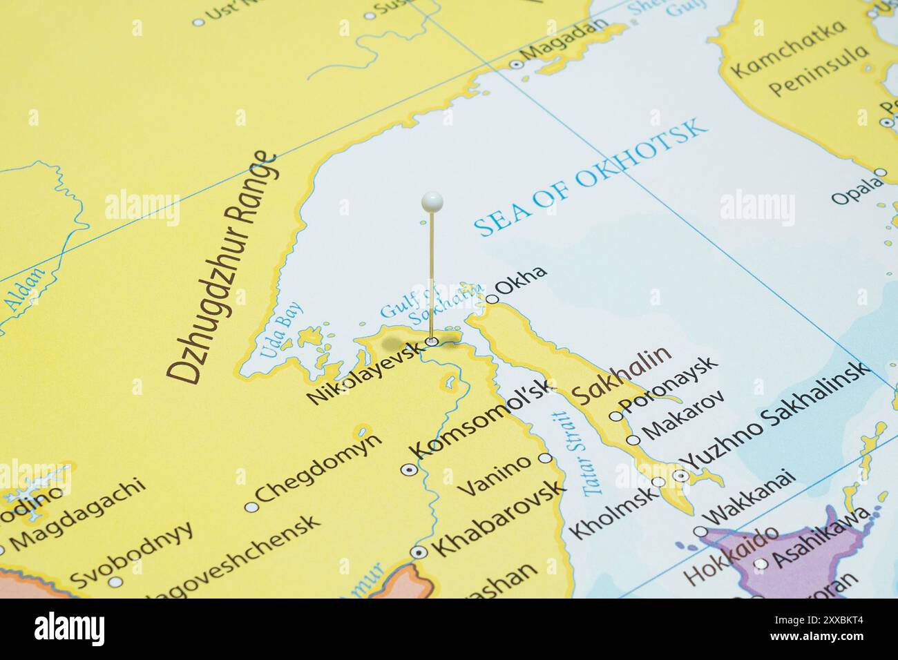 Close up to a Nikolayevsk city with a white pin needle into Russia ...