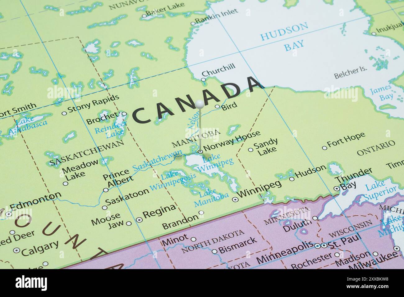 Close up to a Norway House city with a white pin needle into Canada ...