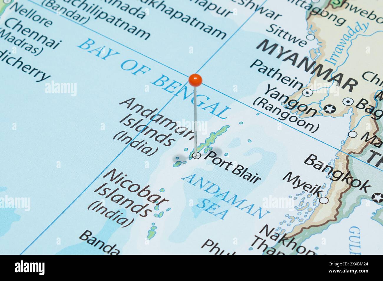 Close up to a Port Blair city with an orange pin needle into India ...
