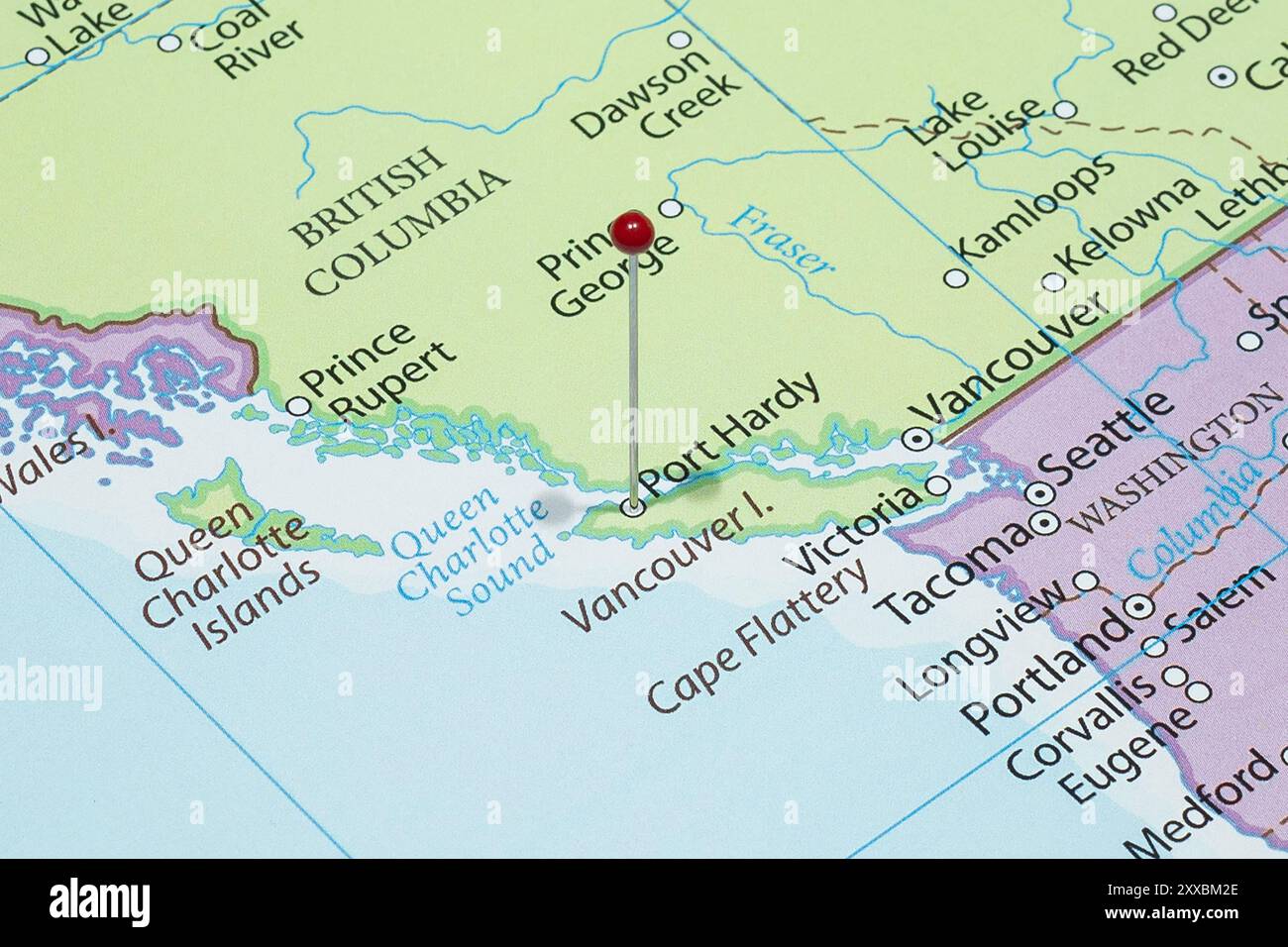 Close up to a Port Hardy city with a red pin needle into Canada country ...