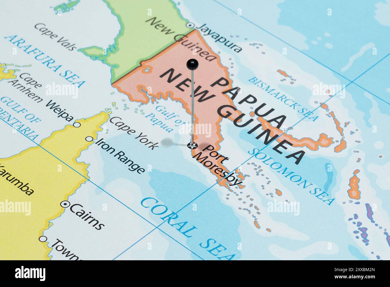 Close up to a Port Moresby city with a black pin needle into Papua New ...