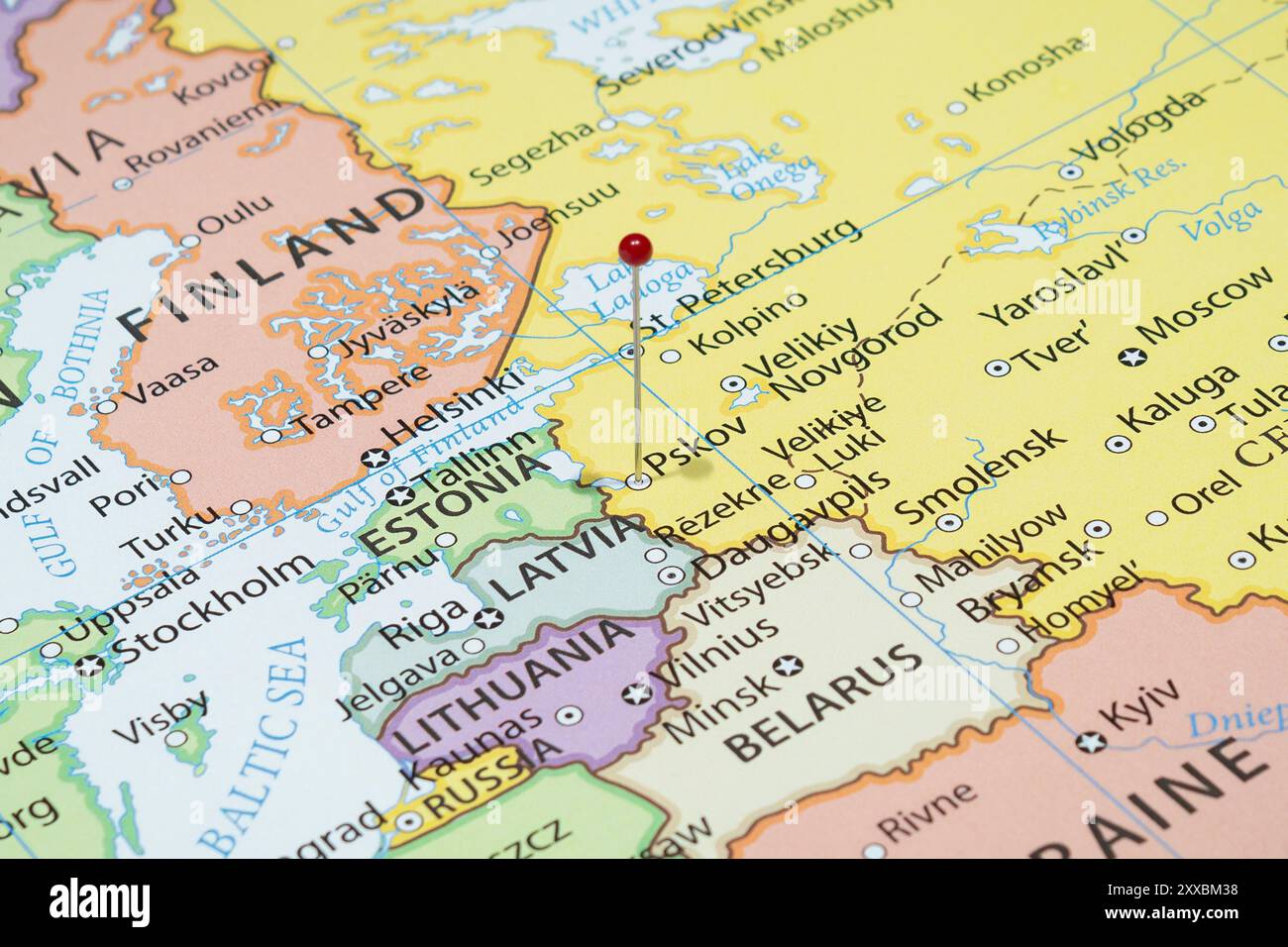 Close up to a Pskov city with a red pin needle into Russia country ...
