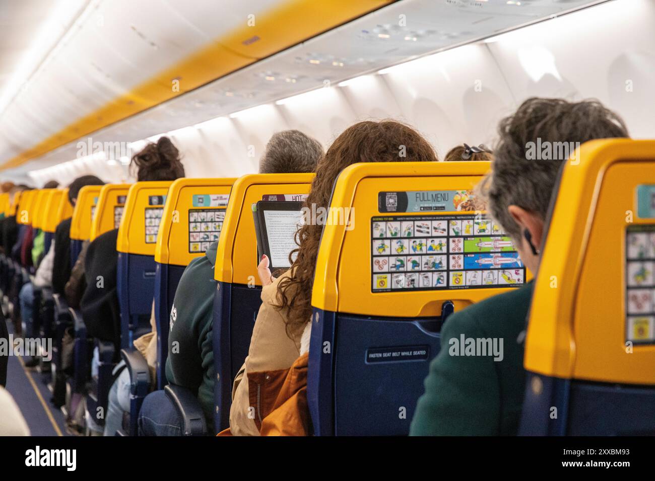 passengers in Ryanair aircraft cabin Stock Photo - Alamy