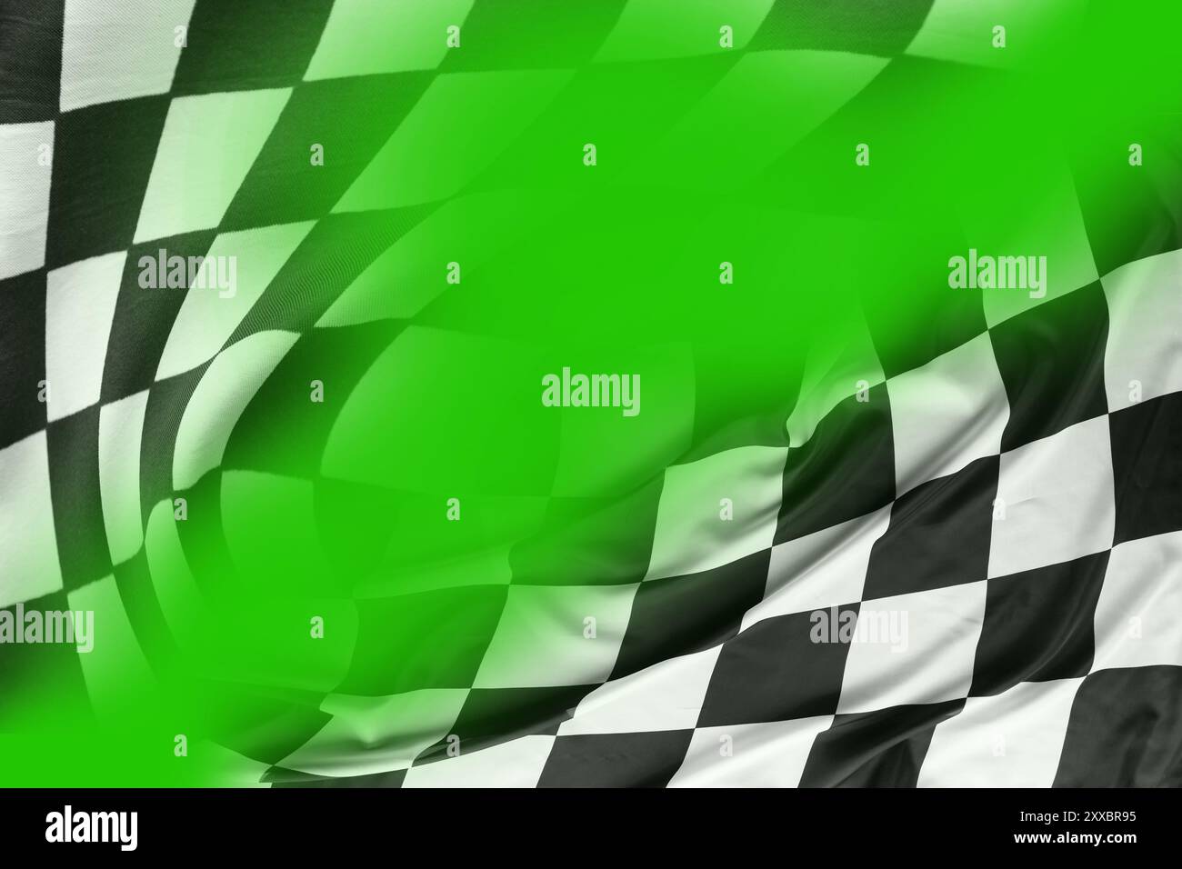 Checkered black and white racing flag on green background Stock Photo ...