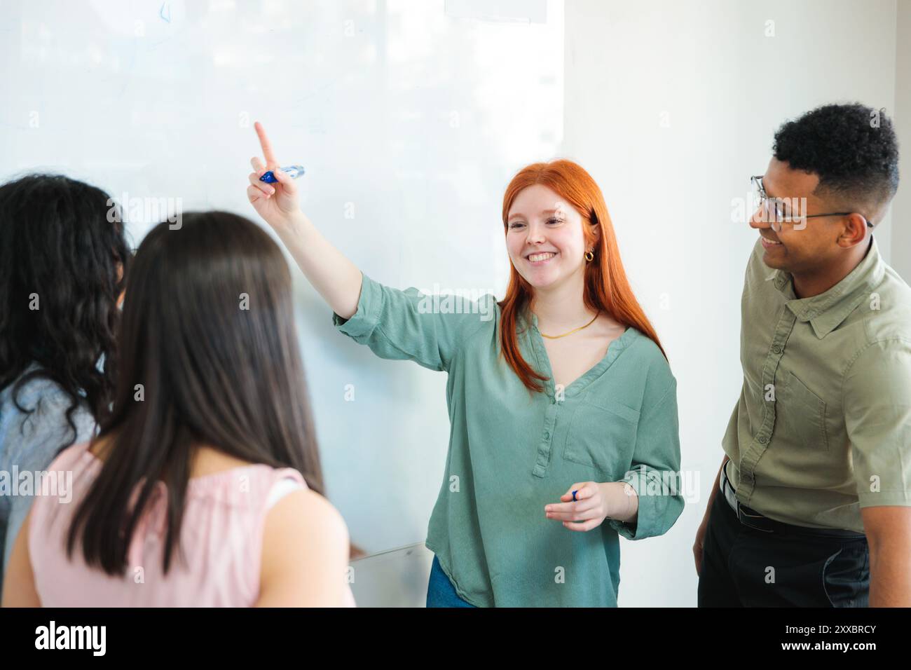 Professional teamwork of young people discussing business strategies ...
