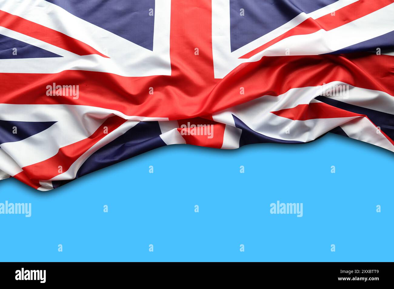 Union Jack flag on blue background Stock Photo - Alamy