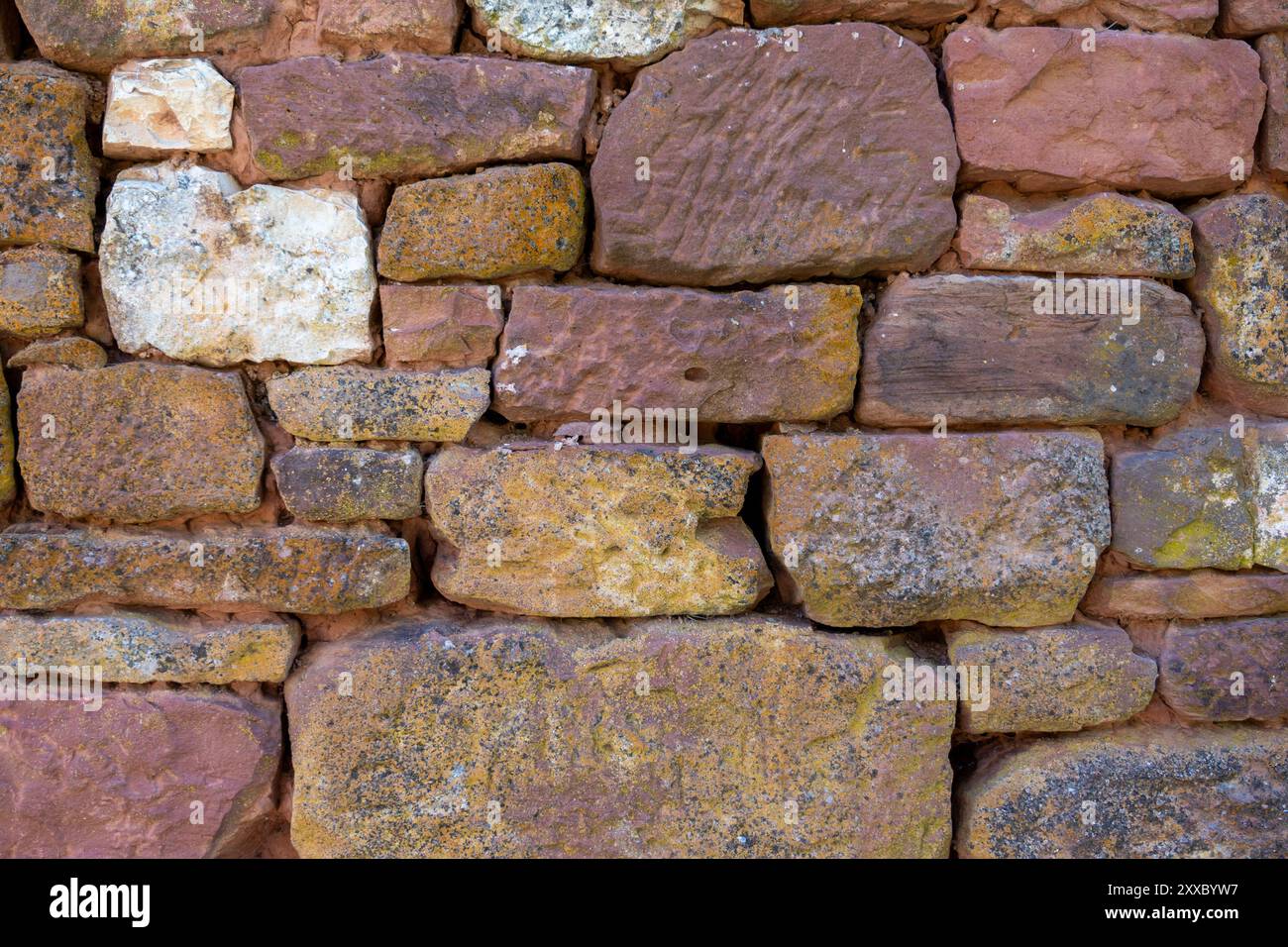 Red brick background in Collonges-la-Rouge village one of the most ...