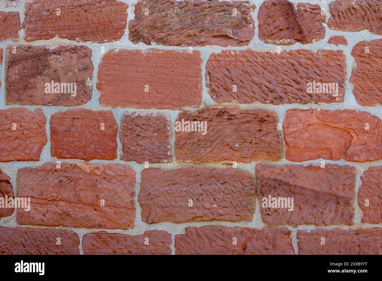 Red brick background in Collonges-la-Rouge village one of the most ...