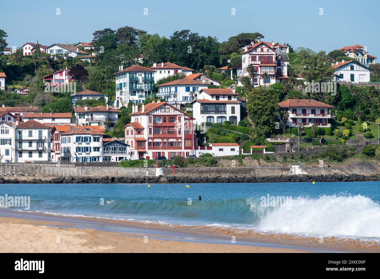 White houses and villas of Cibourne on Basque coast, famous resort, known for beautiful ...