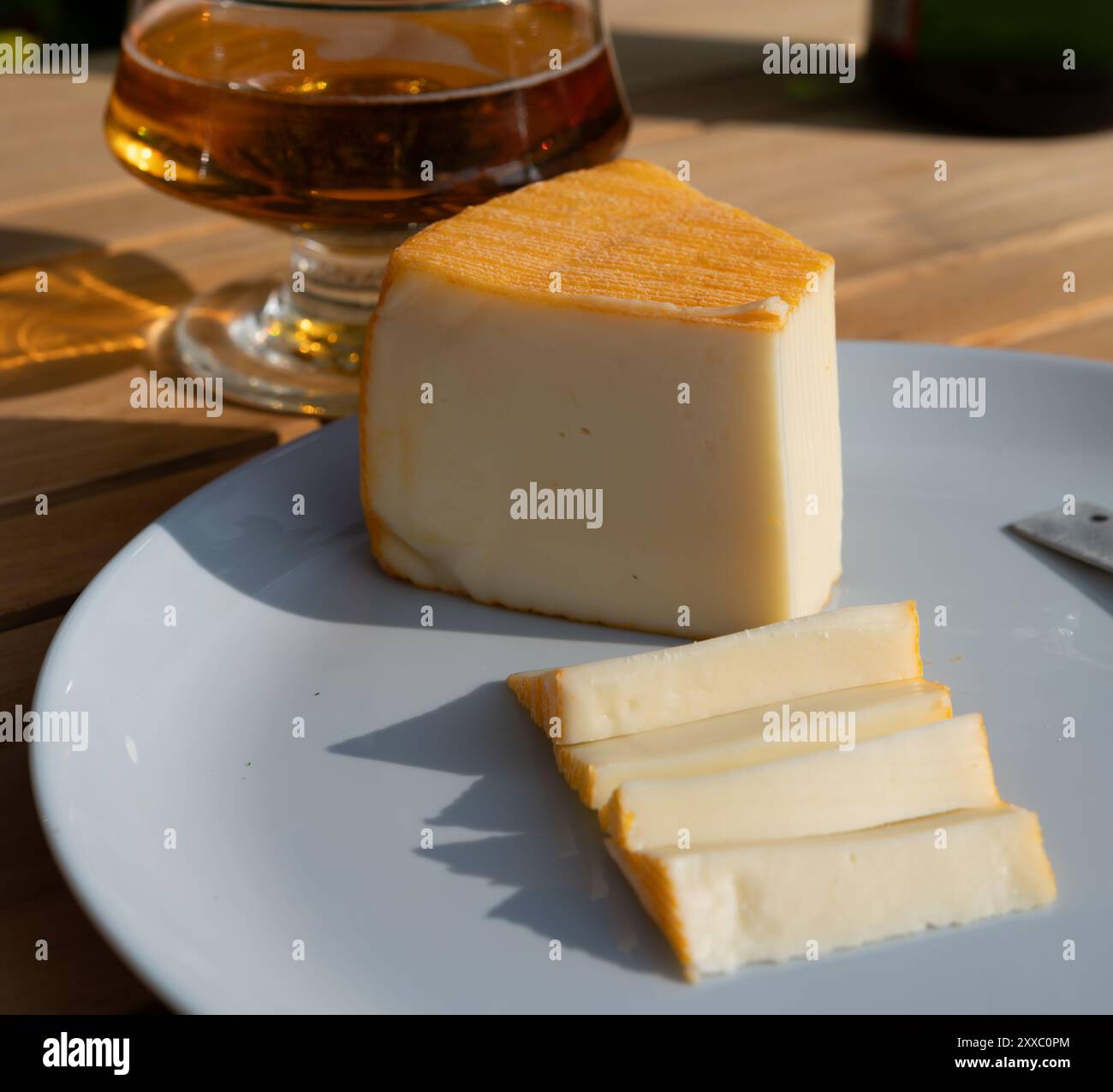 Piece of Saint Paulin creamy, mild, semi-soft French cheese made from ...