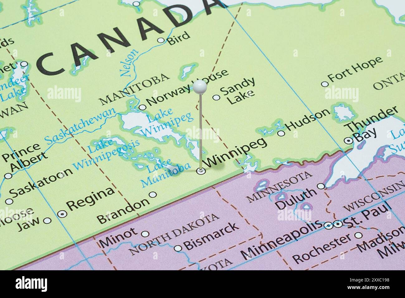 Close up to a Winnipeg with a White pin needle into Canada country ...