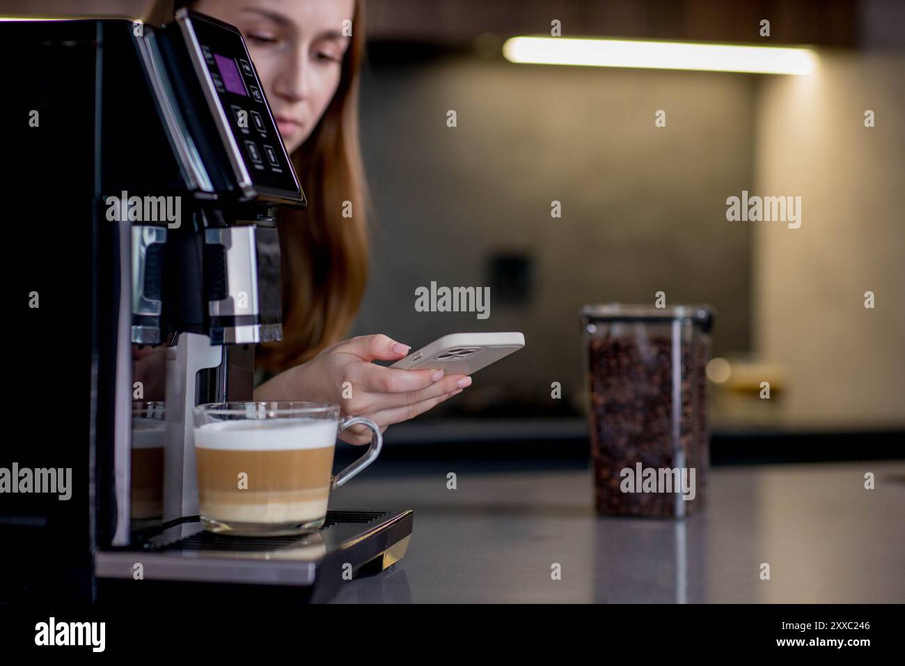 Female controlling coffee machine hi-res stock photography and images ...