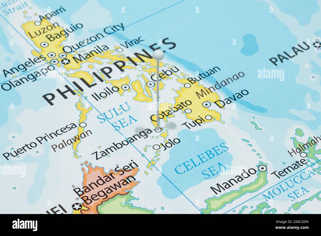 Close up to a Zamboanga city with a white pin needle into Philippines ...