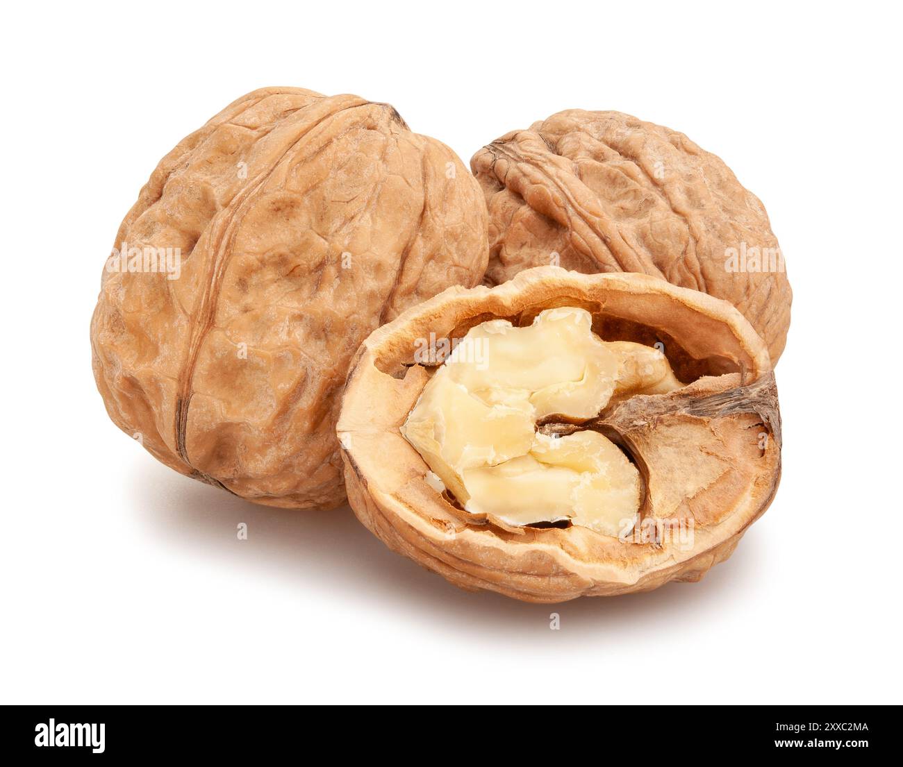 sliced walnuts path isolated on white Stock Photo - Alamy