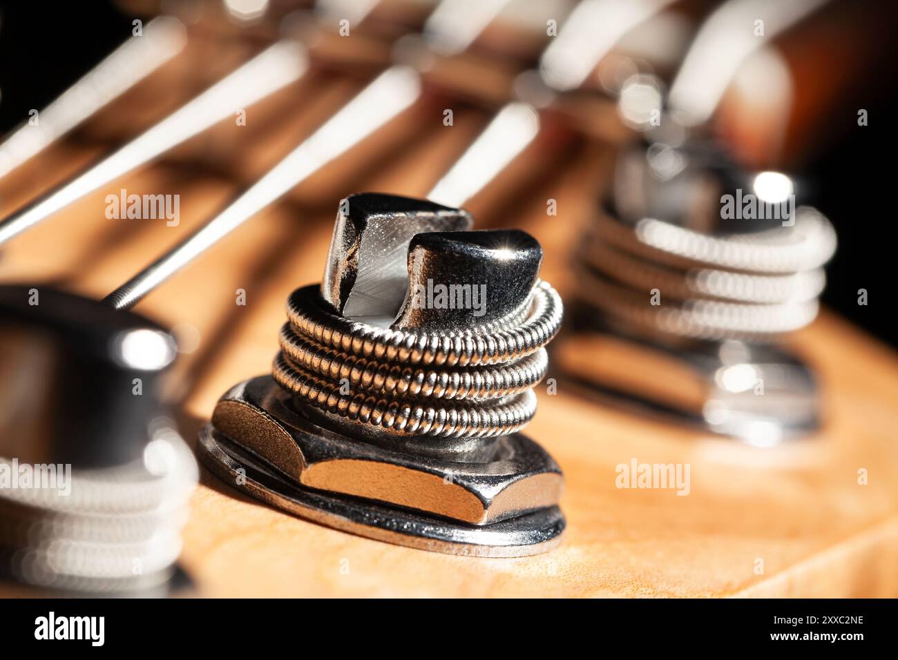 bass guitar headstock tuning post macro closeup Stock Photo - Alamy