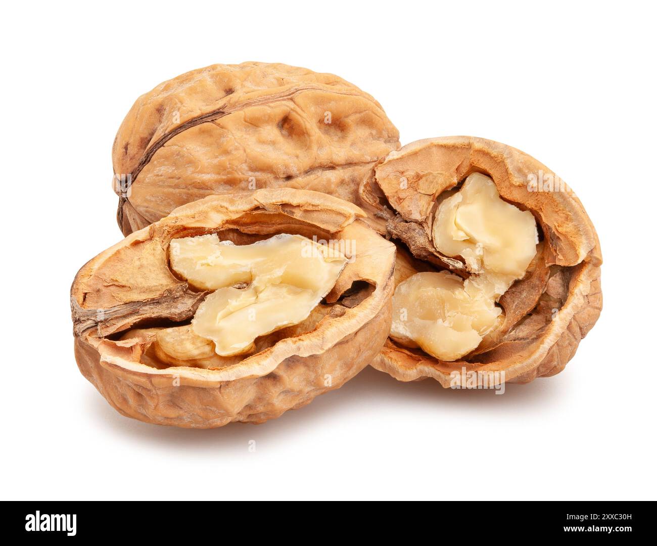sliced walnuts path isolated on white Stock Photo - Alamy