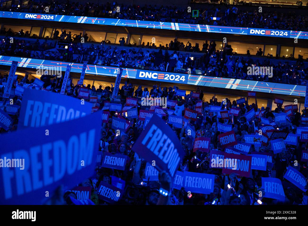 Chicago, United States Of America. 20th Aug, 2024. DNC attendees hold ...
