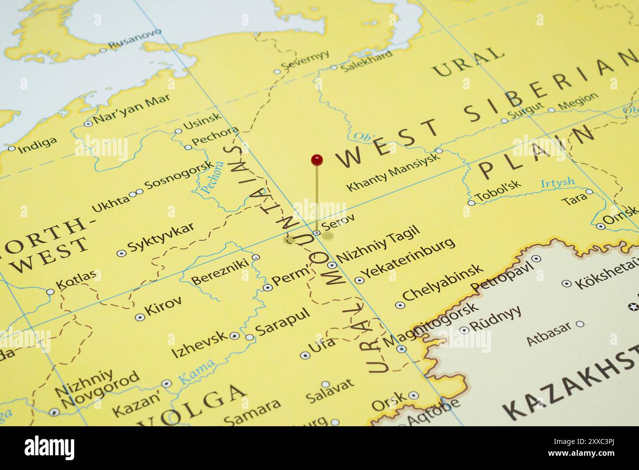 Close up to a Serov city with a blue pin needle into Russia country ...