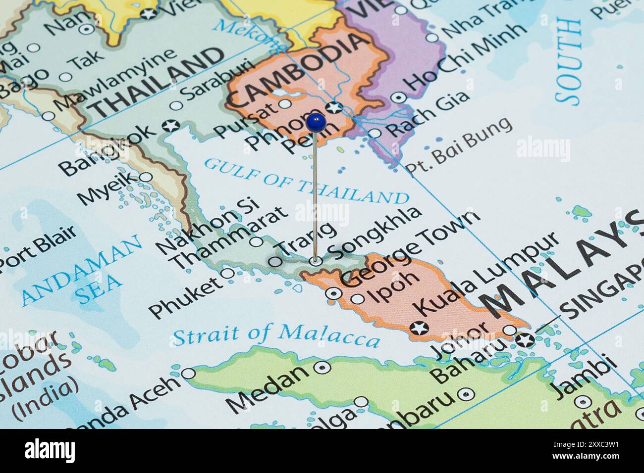 Close up to a Songkhla city with a blue pin needle into Thailand ...