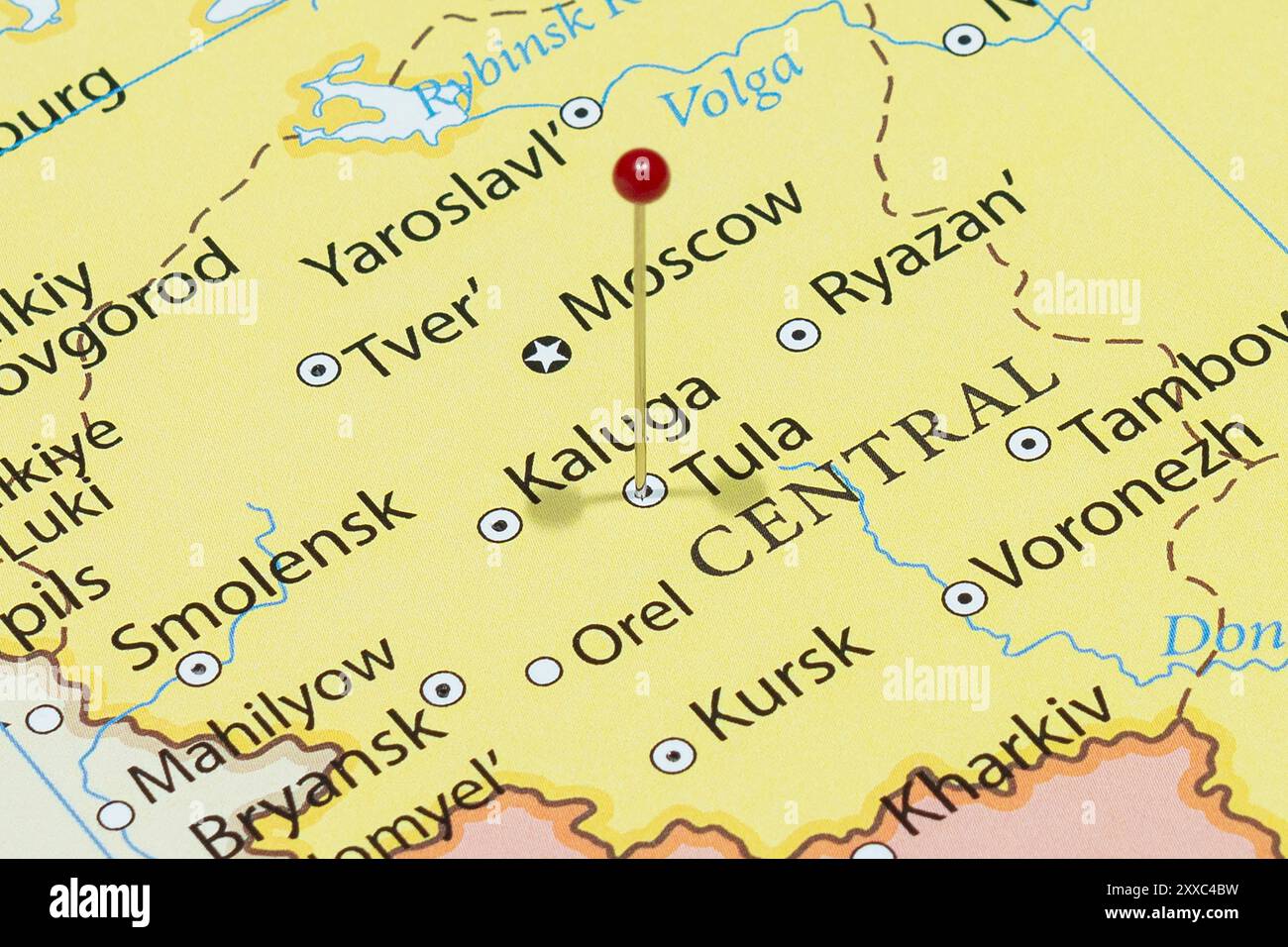 Close up to a Tula city with a red pin needle into Russia country ...