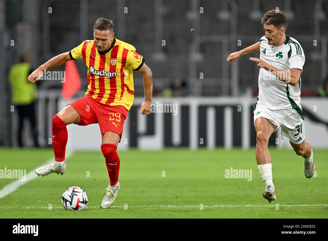 Przemyslaw Frankowski (29) of RC Lens pictured in a duel with Filip ...
