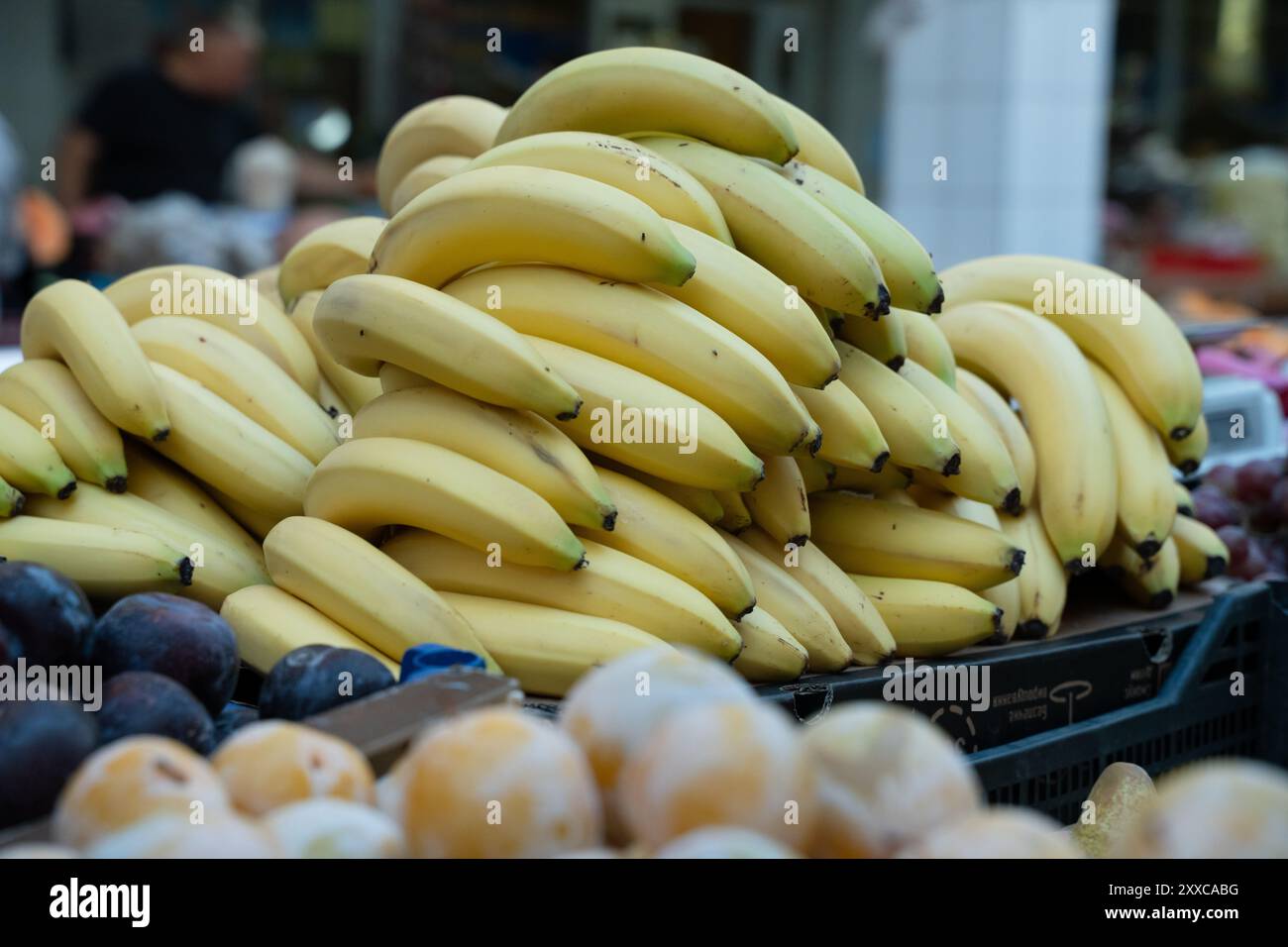 Fresh bananas in plastic boxes on the big market Stock Photo - Alamy