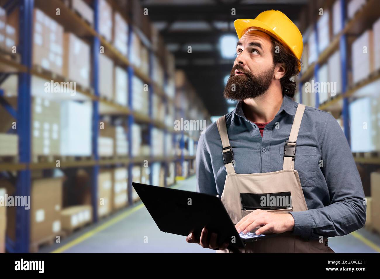 Industrial employee working on stock cargo inventory, counting all ...