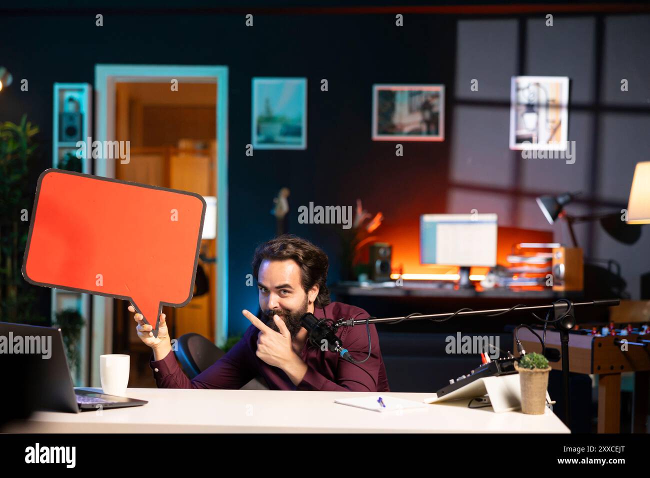 Influencer filming sponsored content, holding empty copy space sign in ...