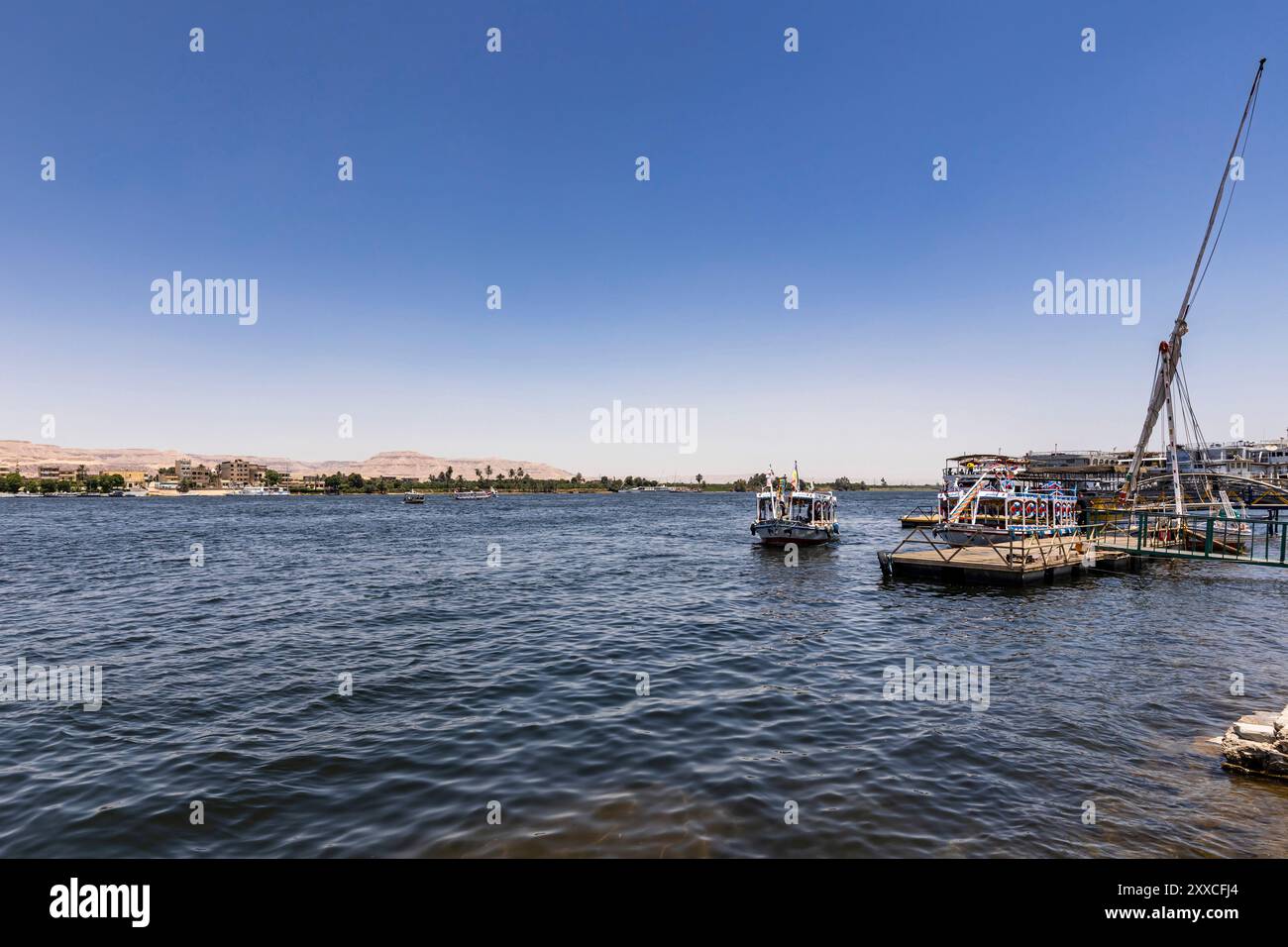East bank of the Nile, riverside with ports, downtown, city center ...