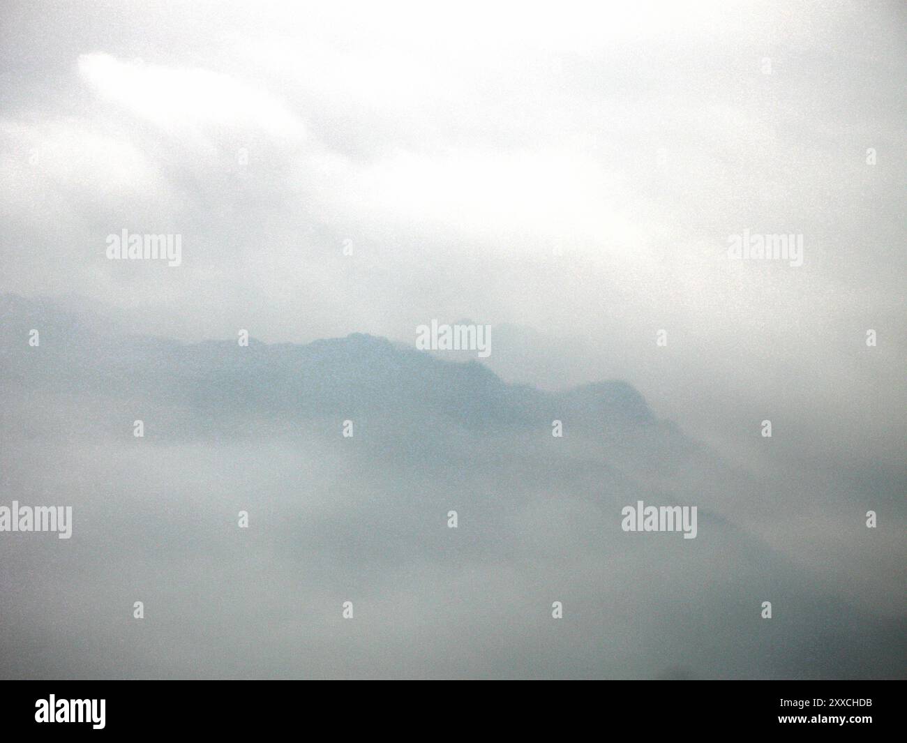 A valley filled with smog as seen from a plane on approach to Beijing ...