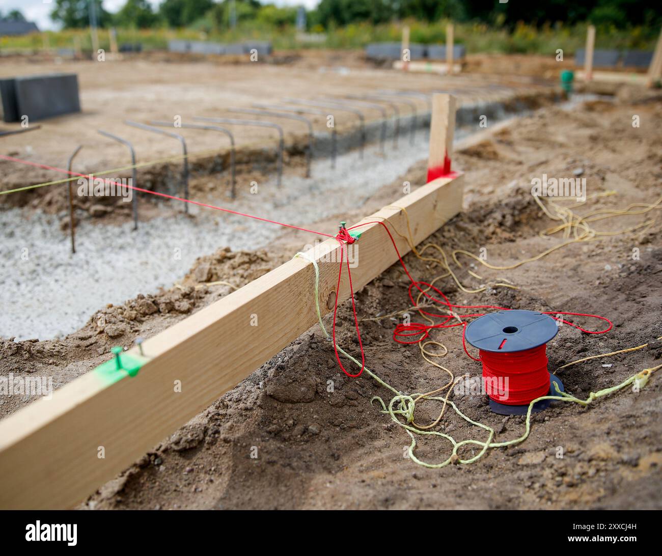 Close up of measuring rope line on the ground of a construction site ...