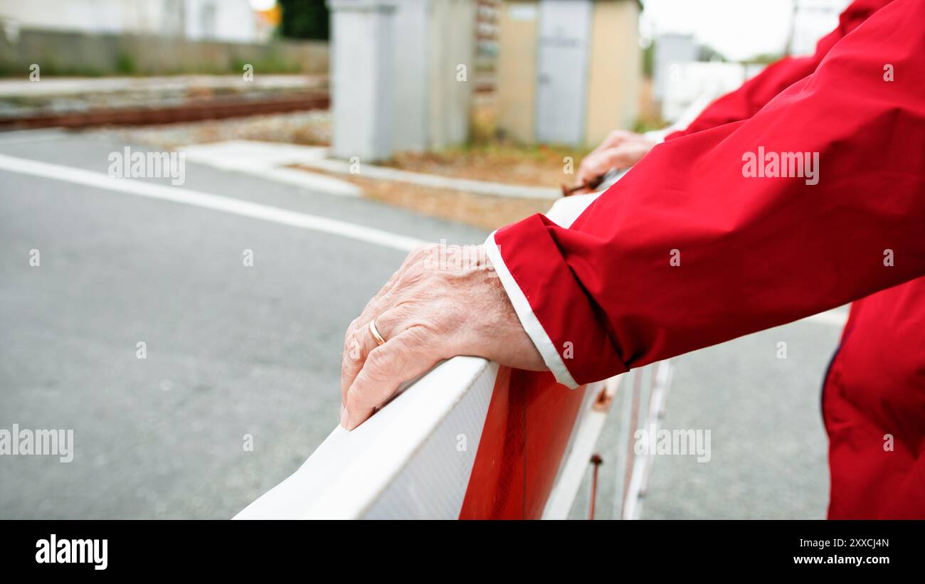 The Hands Of A Man On The Train Railing Stock Photo - Alamy