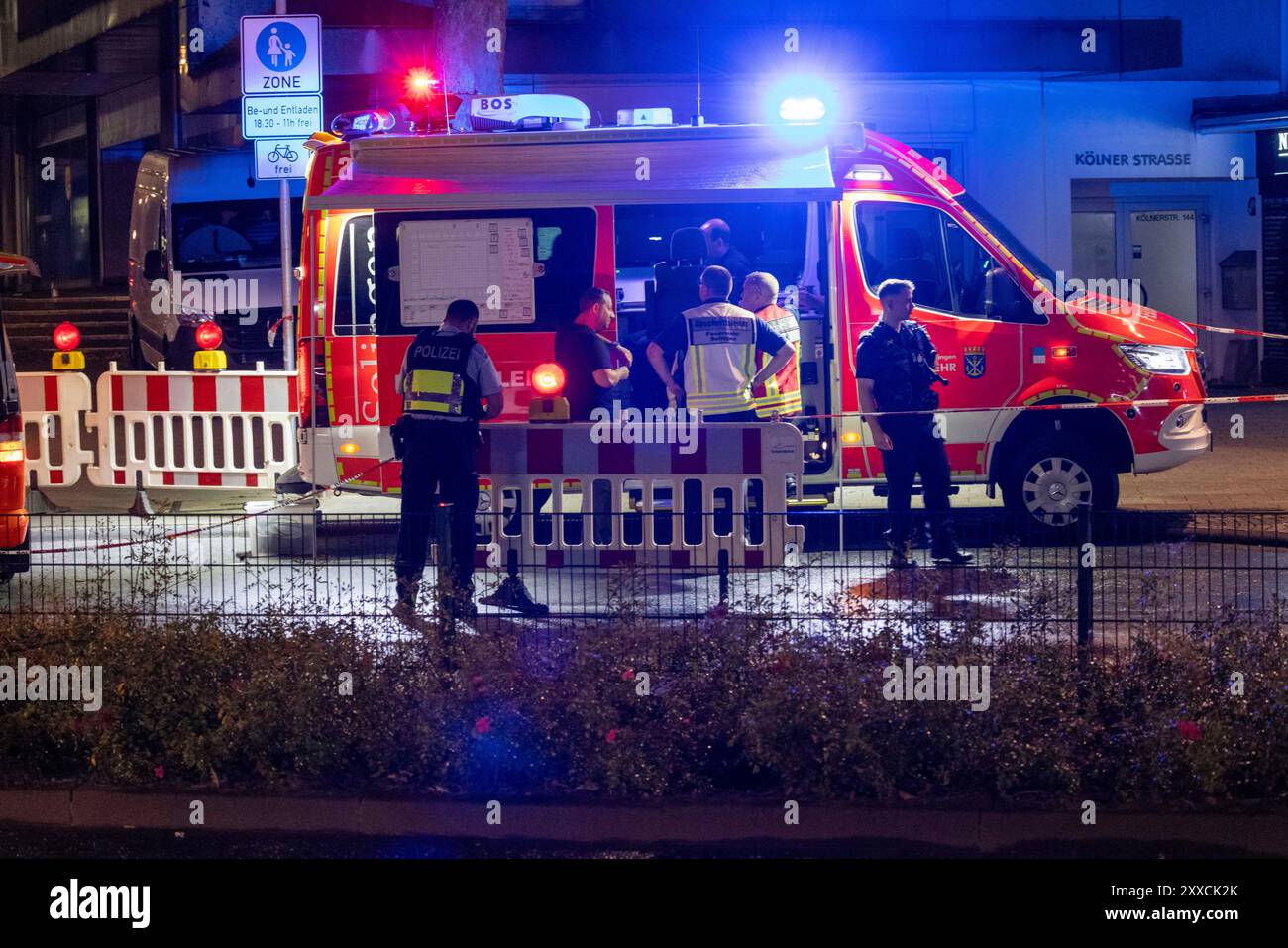 Emergency services and police are deployed near the scene where people ...
