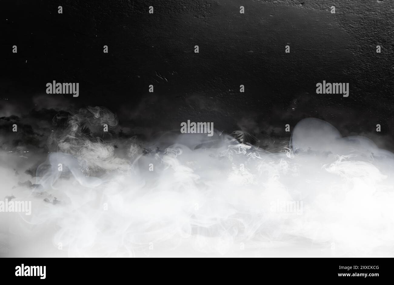White smoke or fog flow on floor. Large mist in dark room on black ...