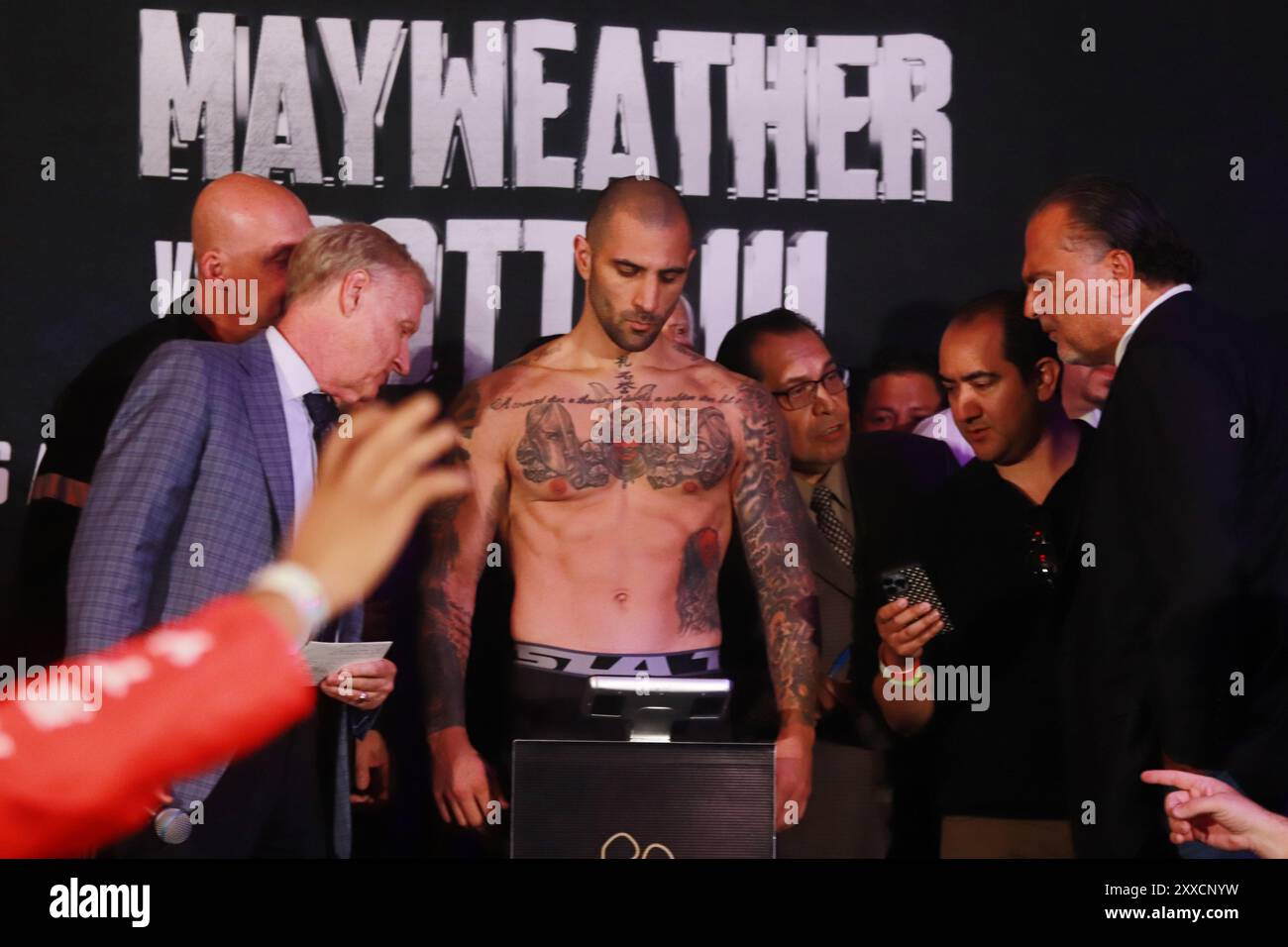 Mexico City, Mexico. 23rd Aug, 2024. John Gotti III poses on the scales ...
